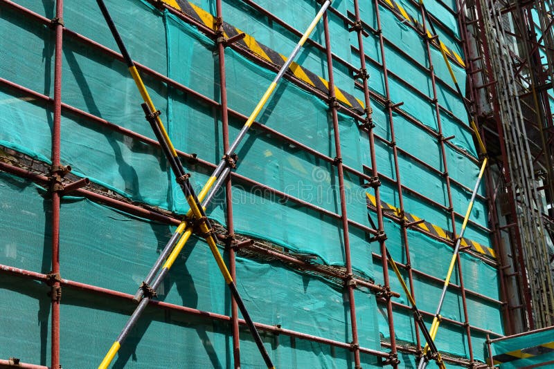 Scaffolding & Protection Netting on an Unfinished Building Stock Image ...