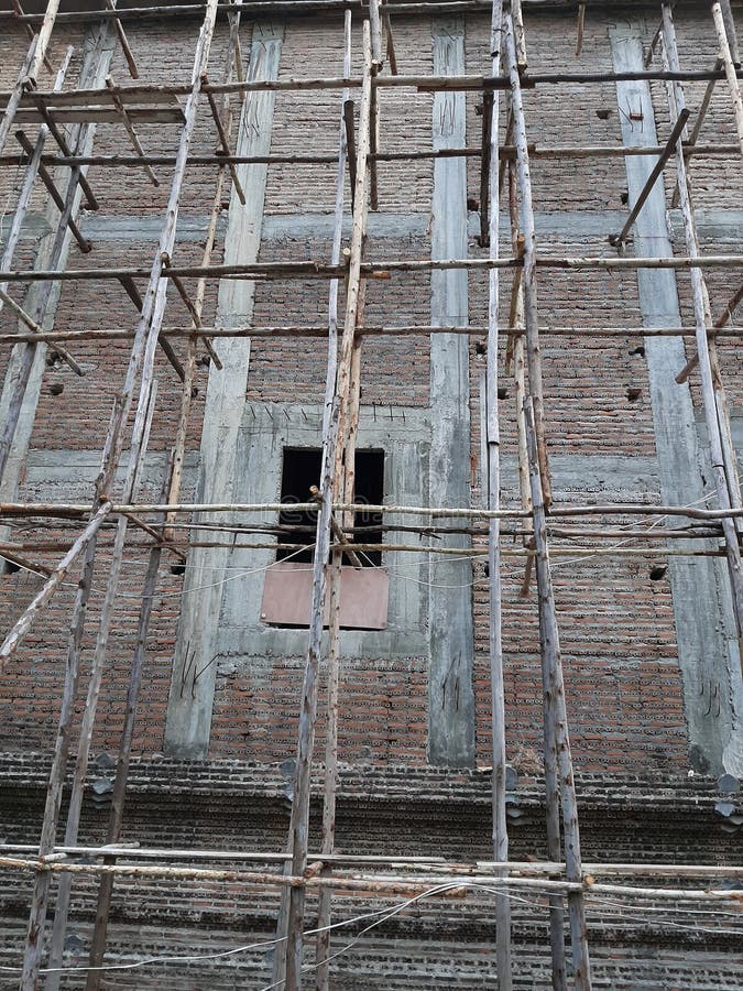 Scaffolding on Brick Brick Wall Under Construction Stock Image - Image ...