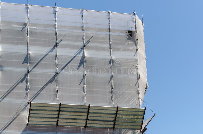 Scaffolding Structure with Fall Protection Sheet. Facade Structure for ...