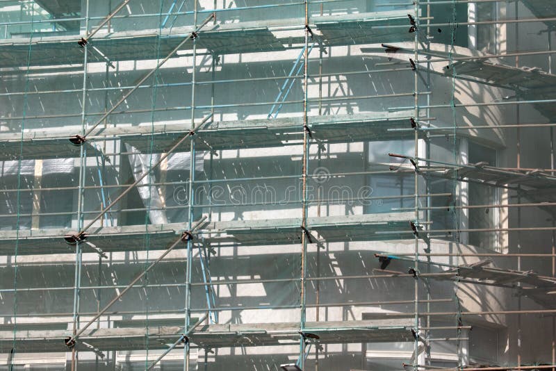 Scaffolding at the Wall of the Building. Stock Photo - Image of project ...