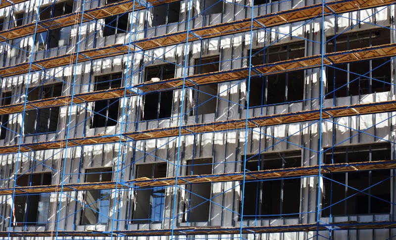 Scaffolding on the Wall of the House Stock Photo - Image of structure ...