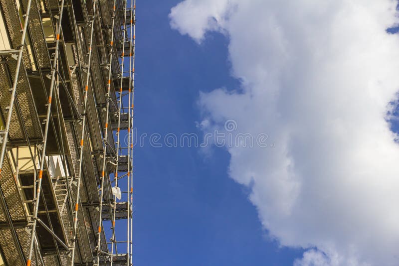 Scaffolding for Work on the Insulation of a High-rise Building Against ...