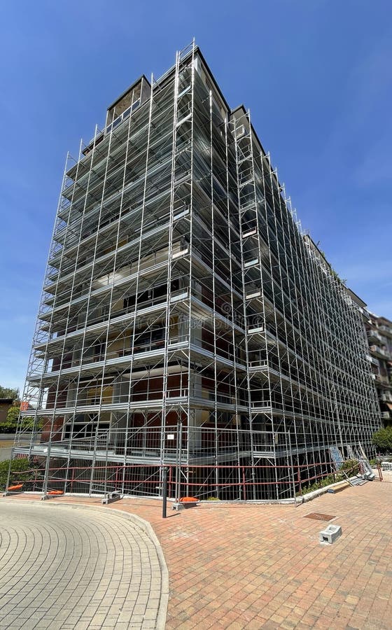 Scaffolding Wrapping Building for Renovation Stock Image - Image of ...