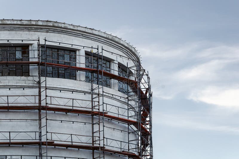 Scaffolds Round an Old White Building. Restoration Stock Photo - Image ...