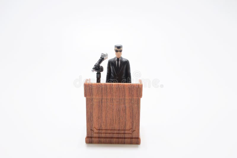 A Scale of Figure Man at Testifying with Desk Stock Image - Image of ...