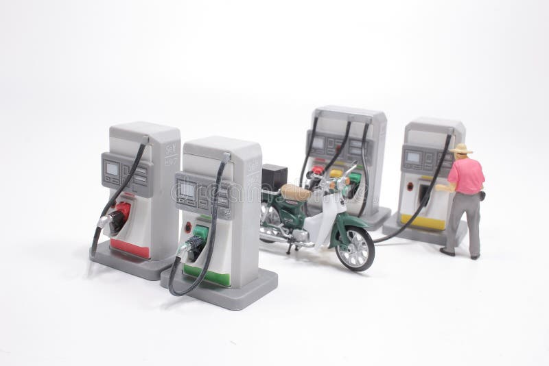 A Scale Fuel Pump of Mini Figure Filling Up Fuel Stock Image - Image of ...