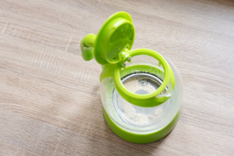 Scale from Hard Water at Bottom of Electric Kettle on Table. Top View ...