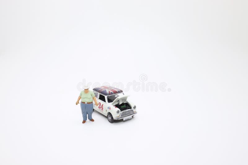 A Scale of Mini Cooper with Figure Editorial Stock Image - Image of ...