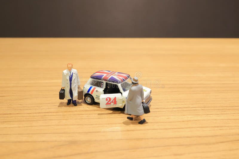 The Scale of Mini Cooper with Figure Editorial Photography - Image of ...