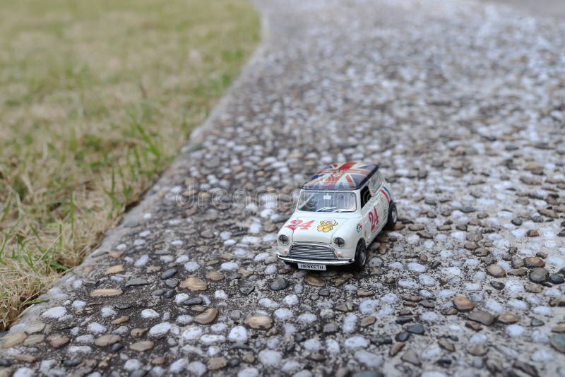 A Scale of Mini Cooper with Figure Editorial Image - Image of figure ...