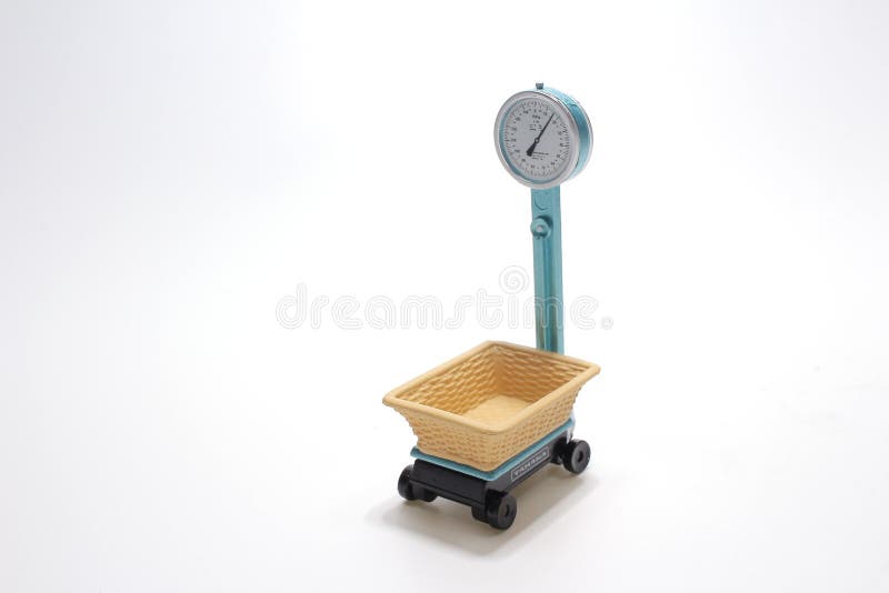 A Scale of Mini Weight Scale at Board Stock Image - Image of body ...