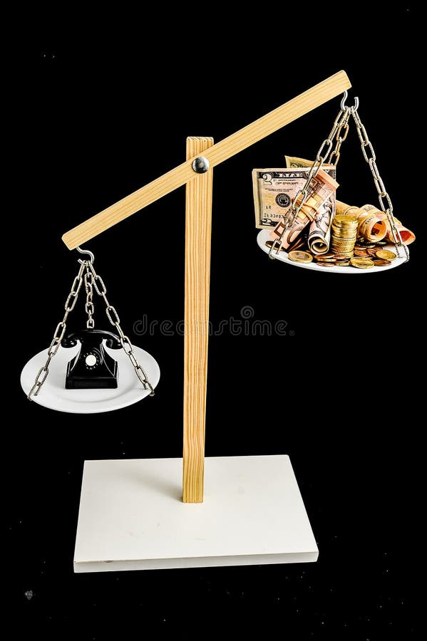 A Scale with a Phone on One Side and Money on the Other Stock Image ...