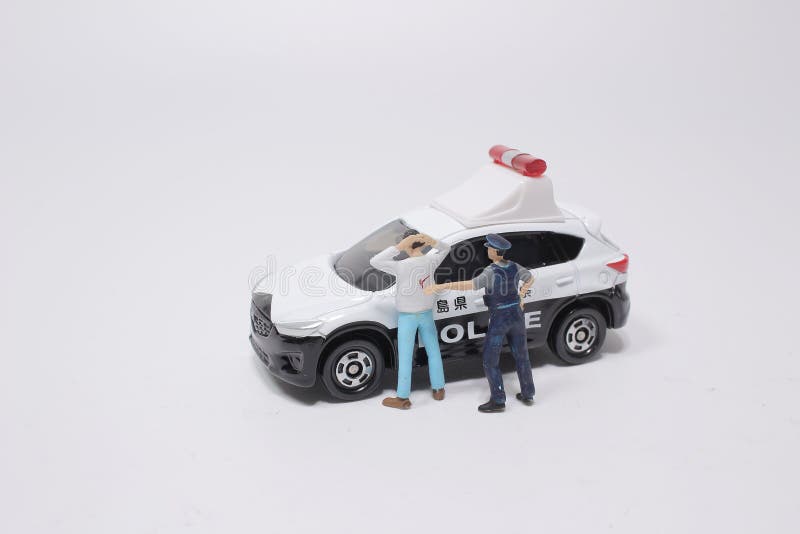 A Scale Police Car Model with Figure Catch Thief Stock Photo - Image of ...