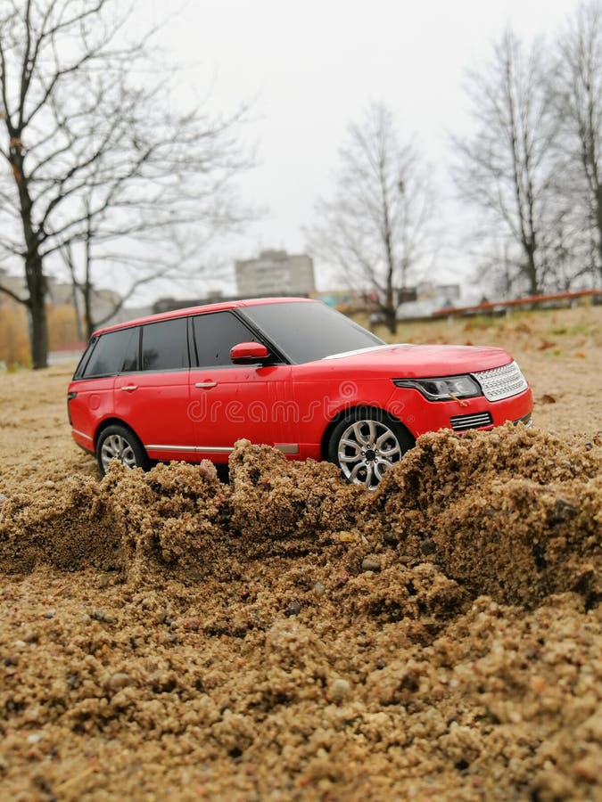 Scaled Plastic Model Car on the Sandy Playground Outside Stock Image ...