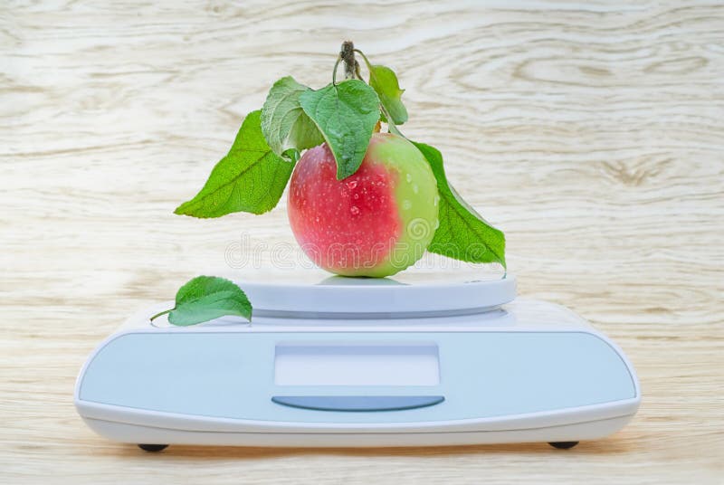 Apples on a scale stock photo. Image of apple, fresh - 26140906