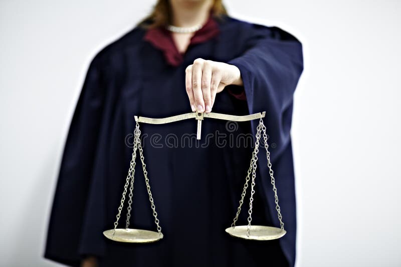 The Scales of Justice. Conceptual Image of a Judge Holding a Scale ...