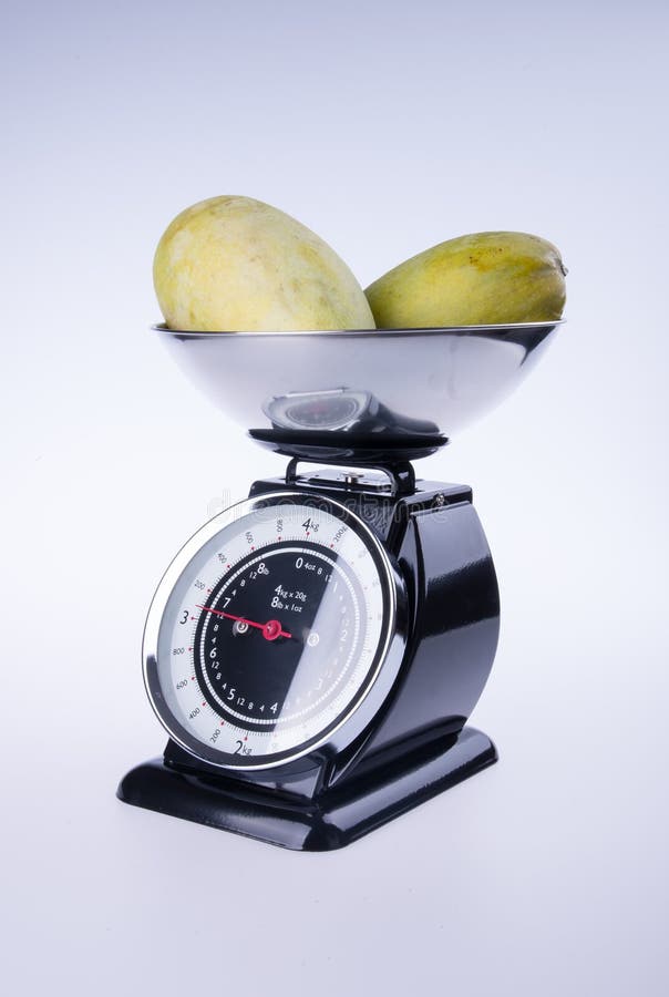 Fresh Green Mango On Weight Scale Stock Photo - Image of chili, ivory ...