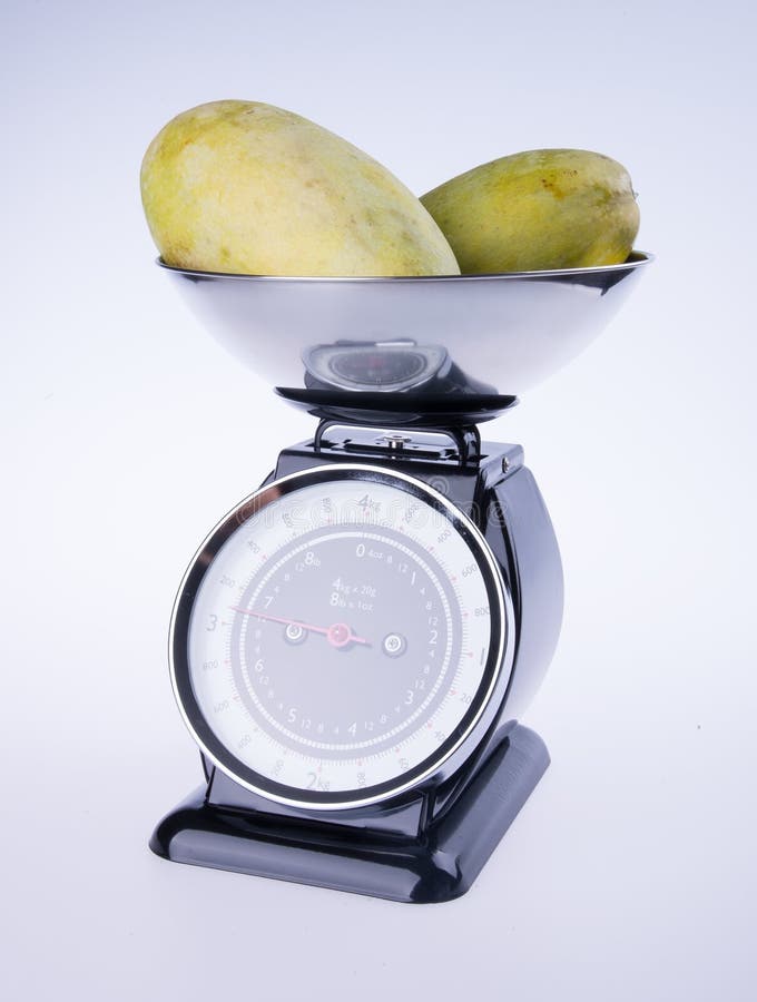 Weighing mango stock photo. Image of balance, weigh, fresh - 85551764