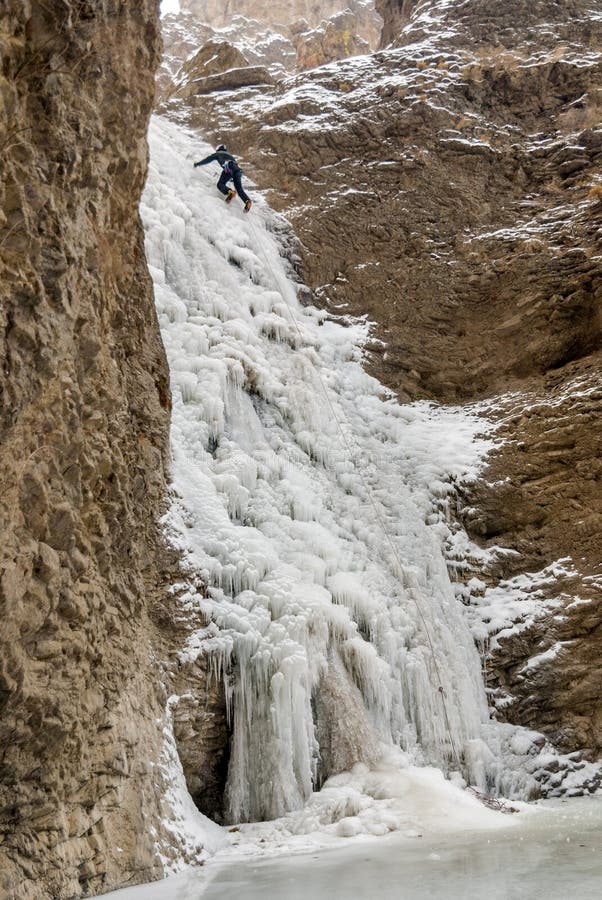 Scaling a Wall of Ice with Ropes Stock Photo - Image of recreation ...