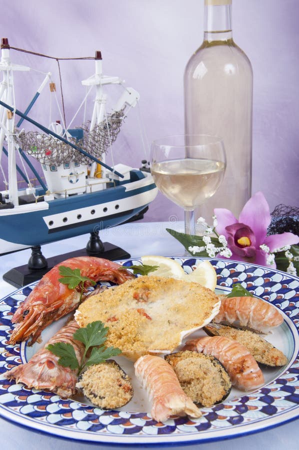 Scallops Baked with Mixed Shellfish Stock Image - Image of mixed ...