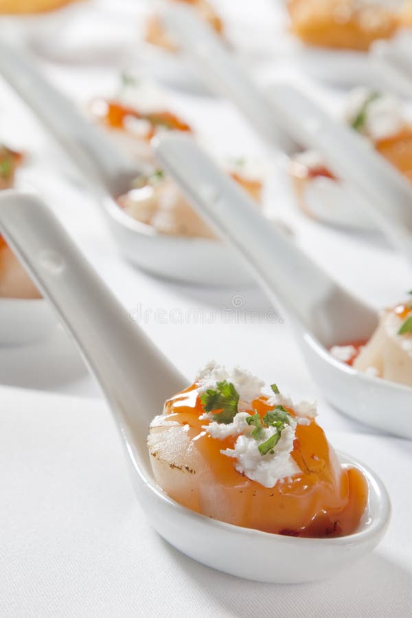 Scallops served on spoon stock photo. Image of appetizer - 11800654
