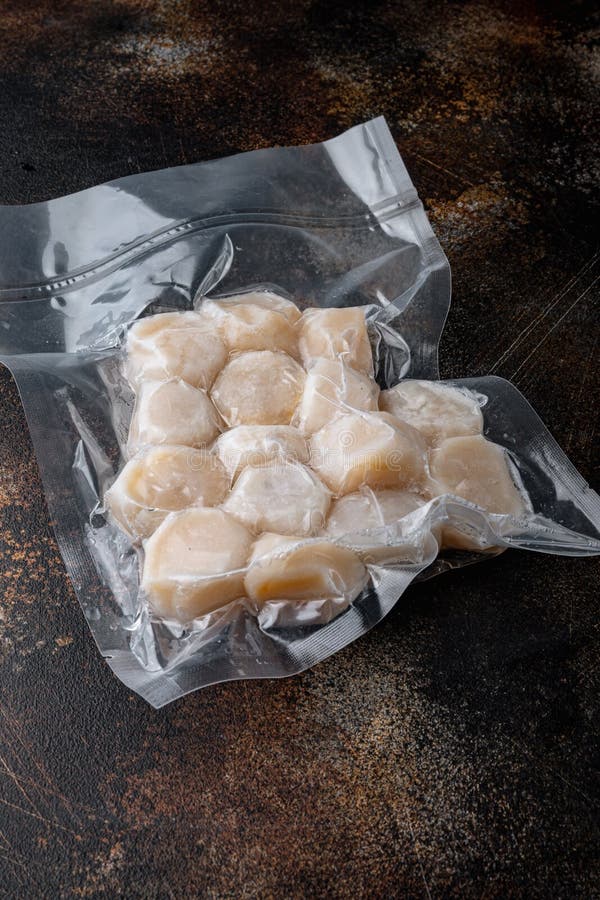 Scallops in Vacuum Pack, on Old Rustic Background Stock Photo - Image ...