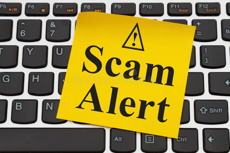 Scam Alert Message on Yellow Sticky Note on a Keyboard Stock Image ...