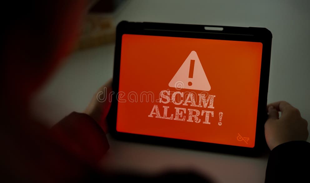 Scam Warning Screen on Tablet Screen while Using. Concept of Security ...