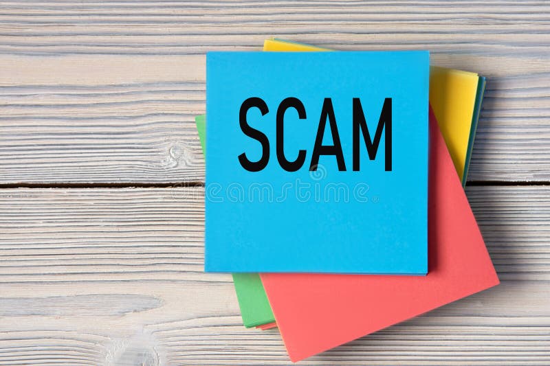 SCAM - Word on Note Paper on Wooden Light Background Stock Image ...
