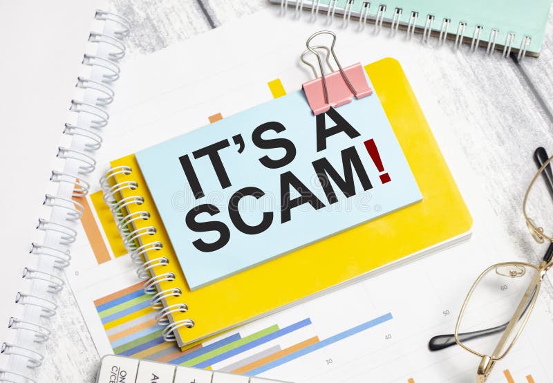 It is a Scam Words on Blue Sticker and Pen, Charts and Calculator Stock ...