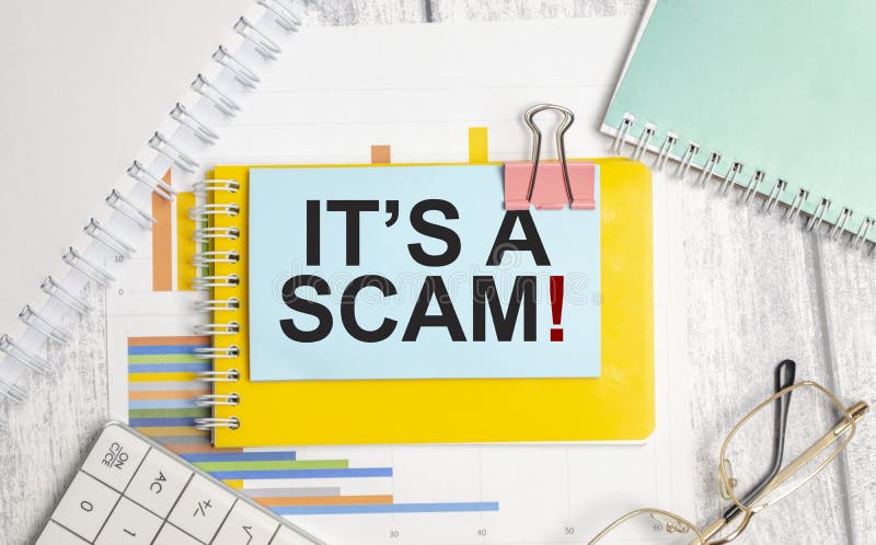It is a Scam Words on Blue Sticker and Pen, Charts and Calculator Stock ...