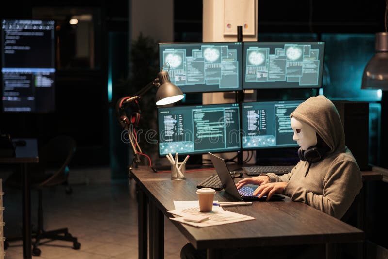 Scammer with Mask and Hood Hacking Security Server Stock Photo - Image ...