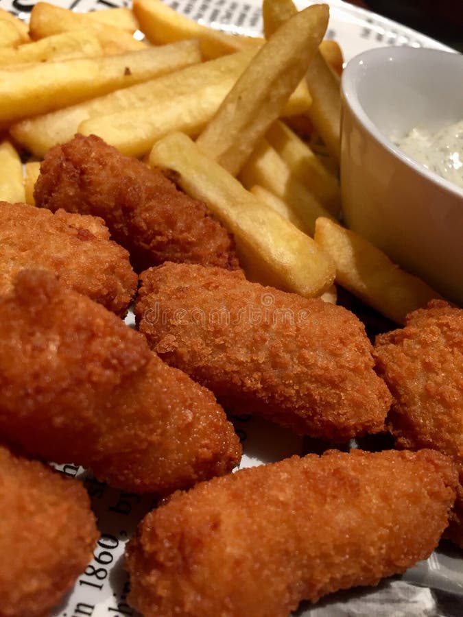 Scampi and Chips Popular British Pub Food, on a Plate, on a Wooden ...