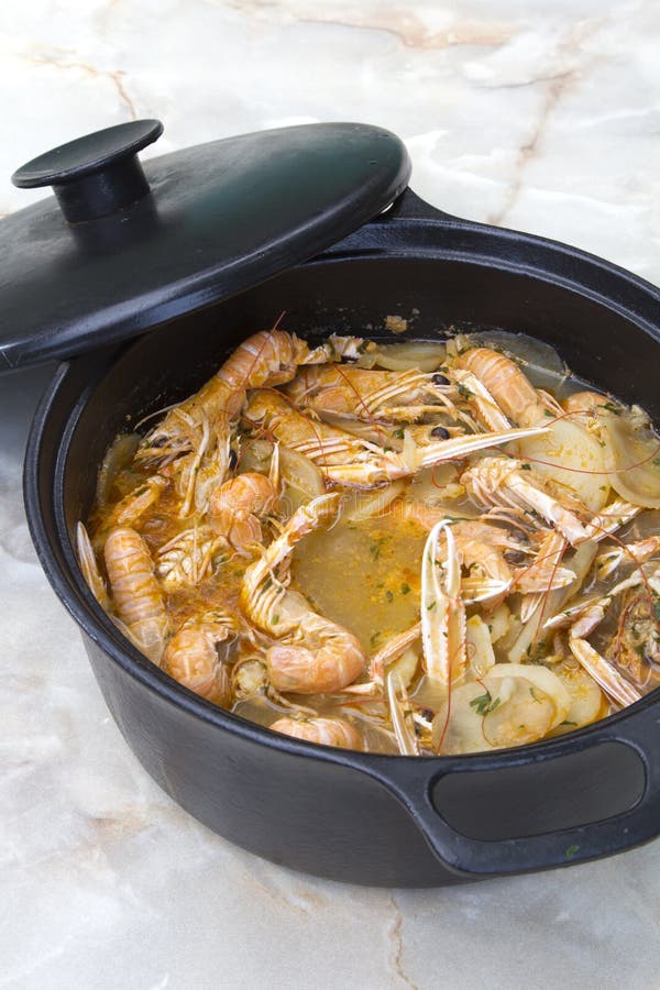 Scampi with Potatoes and Spices Stock Photo - Image of scampi, italian ...