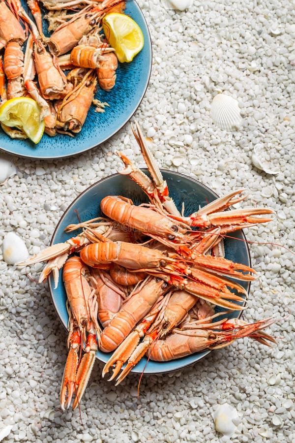 Scampi served with lemon stock photo. Image of european - 33567274