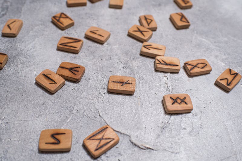 Scandinavian Magic Runes Made of Oak on Concrete. Stock Image - Image ...