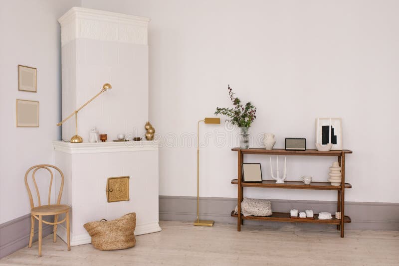 Scandinavian White Room with Fireplace and Wooden Shelf Stock Photo ...