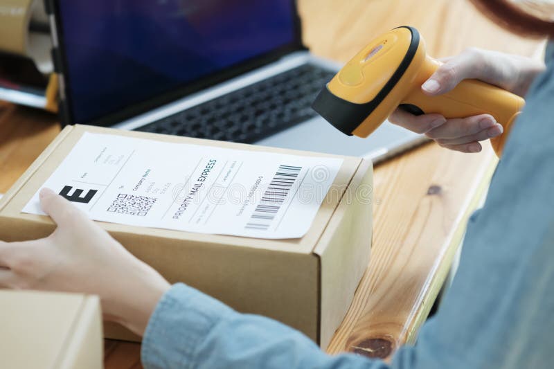 Scanning Barcode on Shipping Box with Scanner Stock Photo - Image of ...