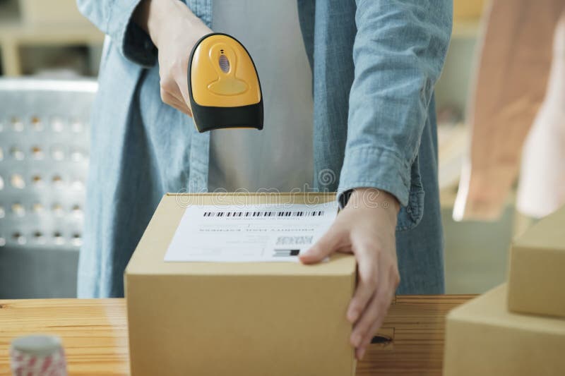 Scanning Barcode on Shipping Box with Scanner Stock Image - Image of ...