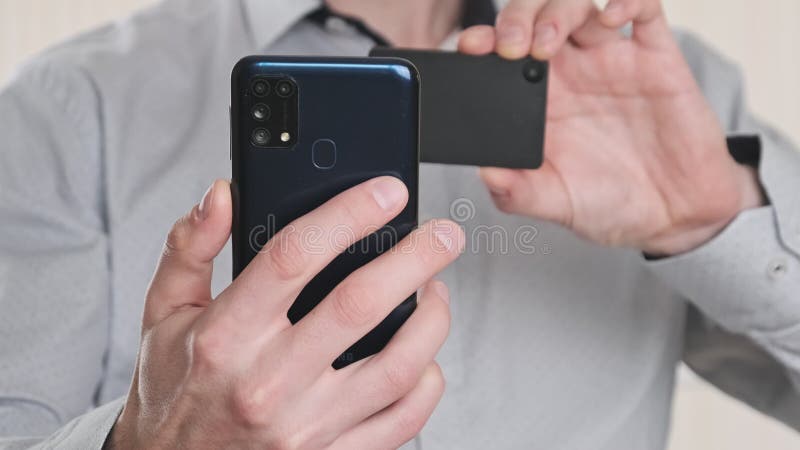 Scanning QR Code with a Modern Cold Crypto Wallet and Smartphone Stock ...