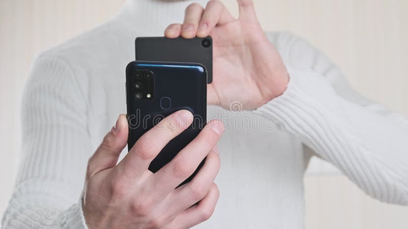 Scanning QR Code with a Modern Cold Crypto Wallet and Smartphone Stock ...