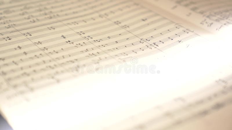 Scanning of Yellowed Page of Notebook with Musical Notation Stock Video ...