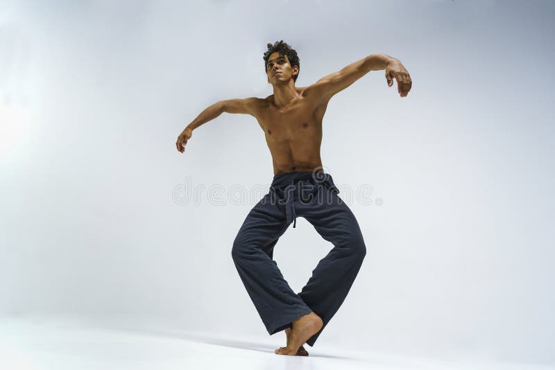 Scantily Clad Mulatto Dancer, Ballet Dancer, Man Shows Dance Elements ...