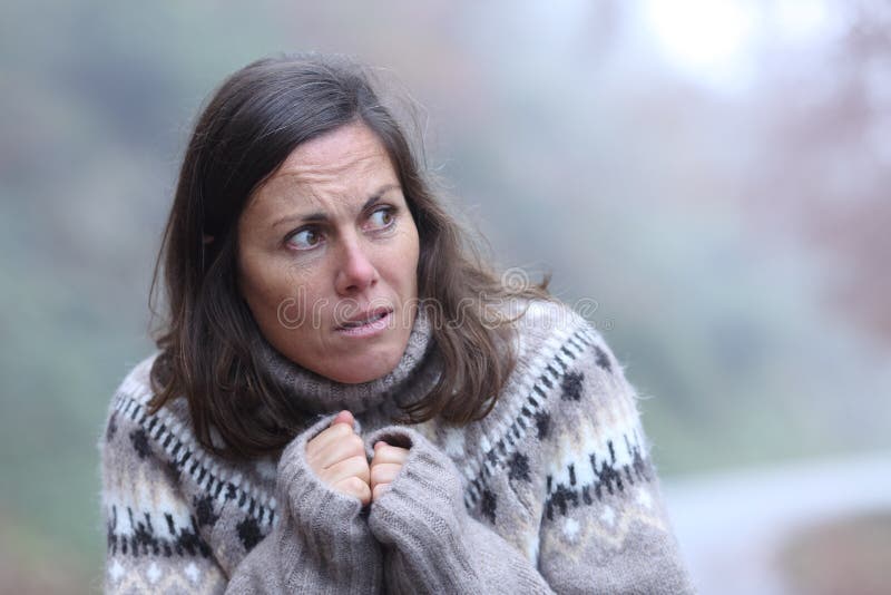 Scared Adult Woman Looking at Side in a Park Stock Photo - Image of ...