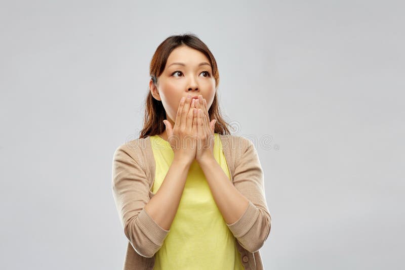 Scared Asian Woman Over Grey Background Stock Image - Image of ...