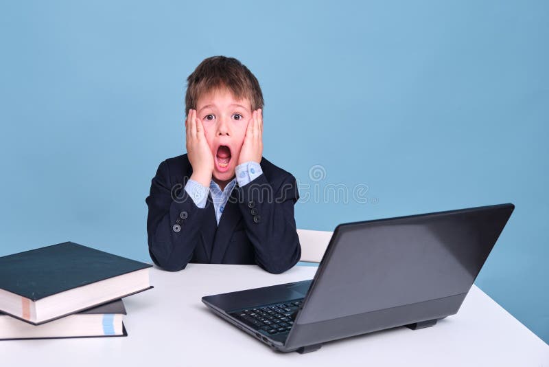 A Scared Boy in a School Suit on Distance Learning, Copy Space on a ...