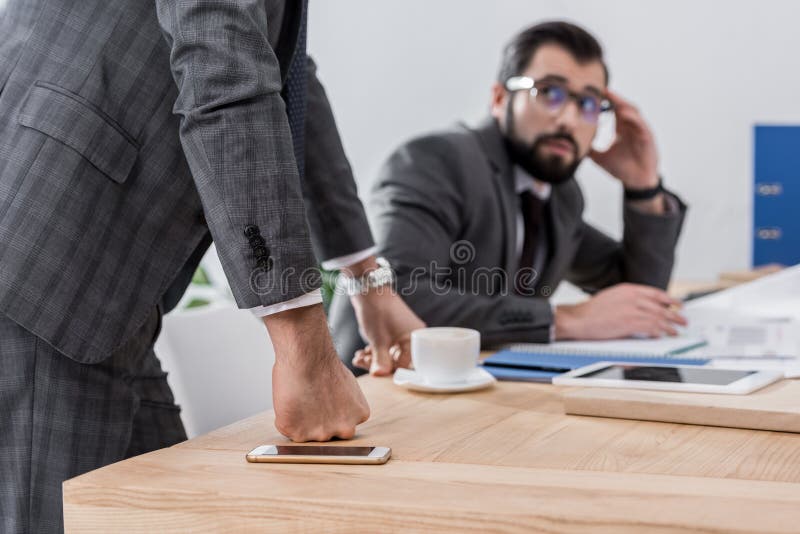 Scared Businessman Sitting at Table and Looking Stock Photo - Image of ...