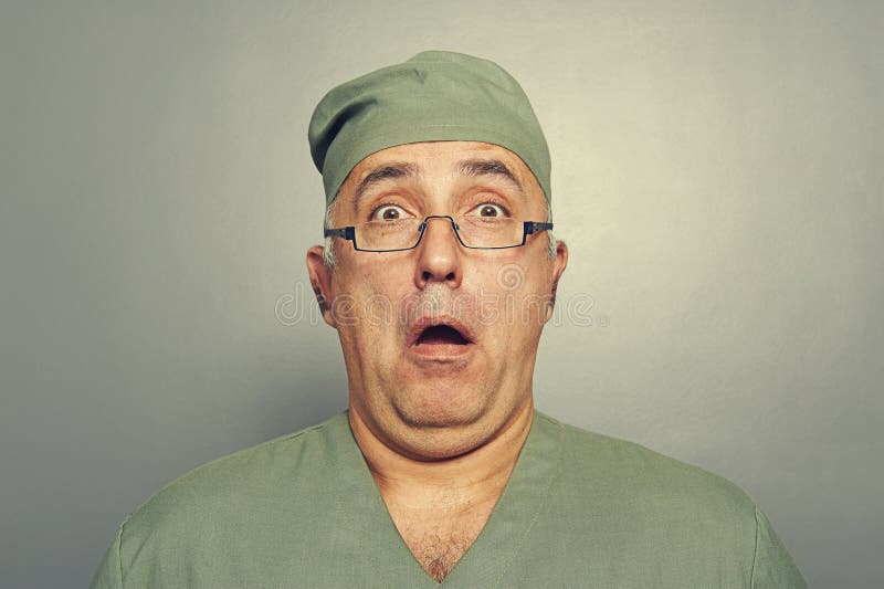 Scared doctor in glasses stock photo. Image of elderly - 35124176
