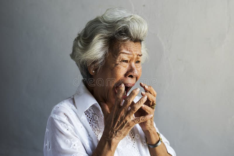 A Scared Elderly Woman is Screaming Stock Photo - Image of worried ...