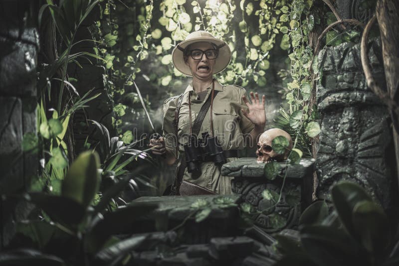 Scared Explorer Finding a Skull in the Jungle Stock Image - Image of ...